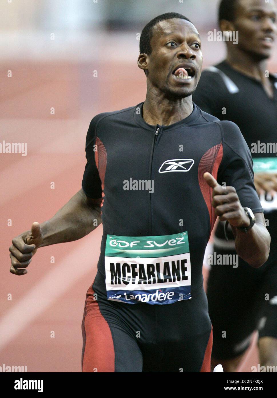 Danny McFarlane of Jamaica wins the men's 400 meters hurdles race ...
