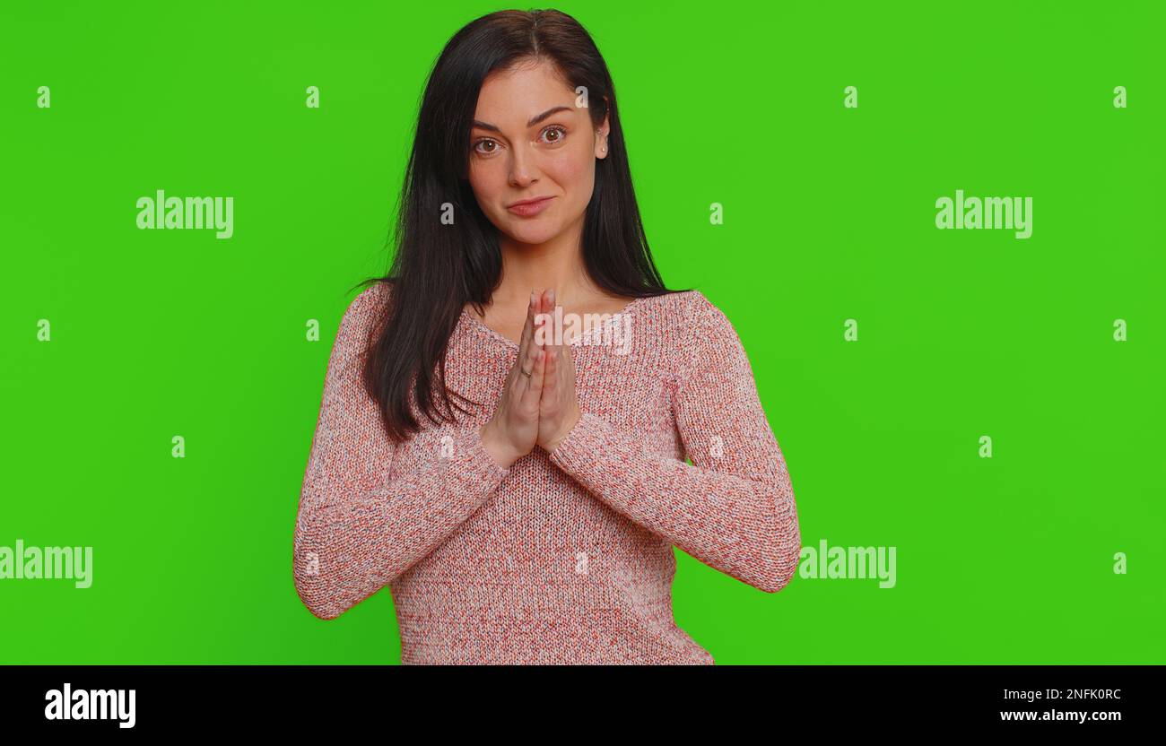 Please, God, forgive me. Young woman sincerely praying to God and ...