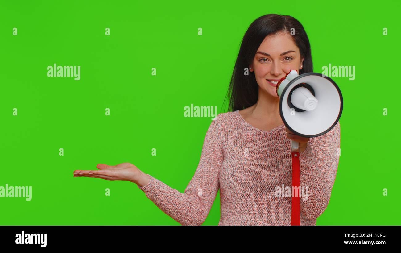 Woman talking with megaphone, proclaiming news, loudly announcing advertisement, warning using ...