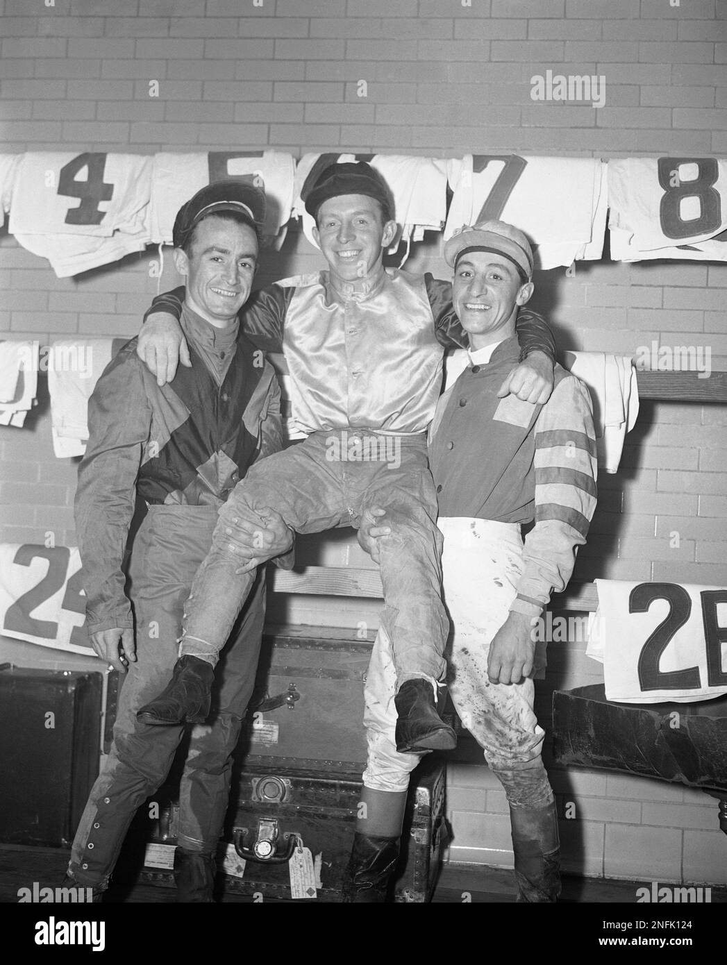 Three of the top Jockeys pose at the Belmont opening July 4, 1945 in ...