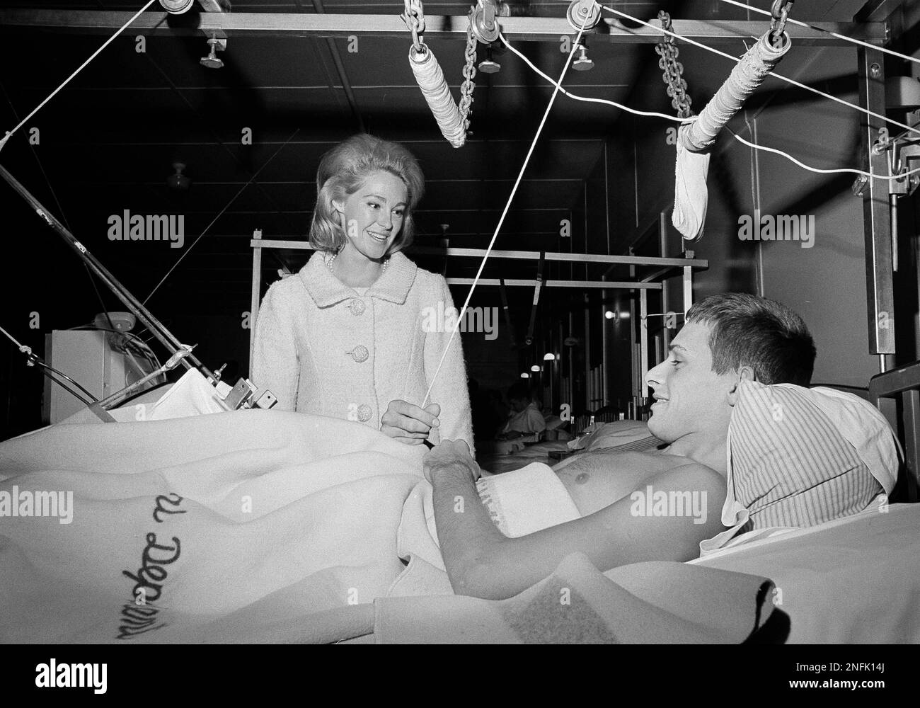 Joan Kennedy, left, shown as she talks with Marine Wirt Eaton, who was ...