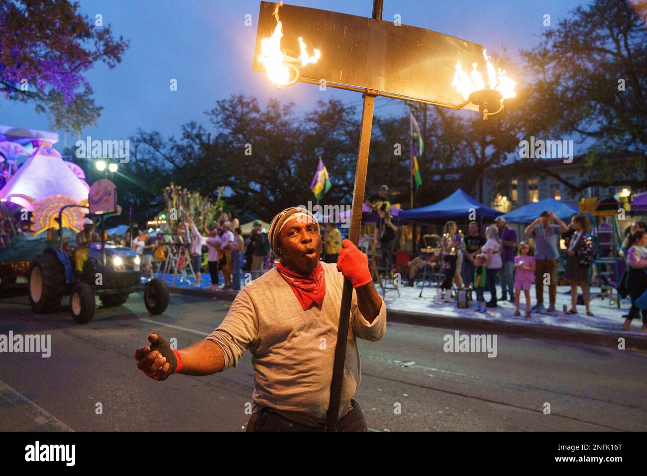 Parade goers and floats are seen at the Knights Of Babylon Parade ...