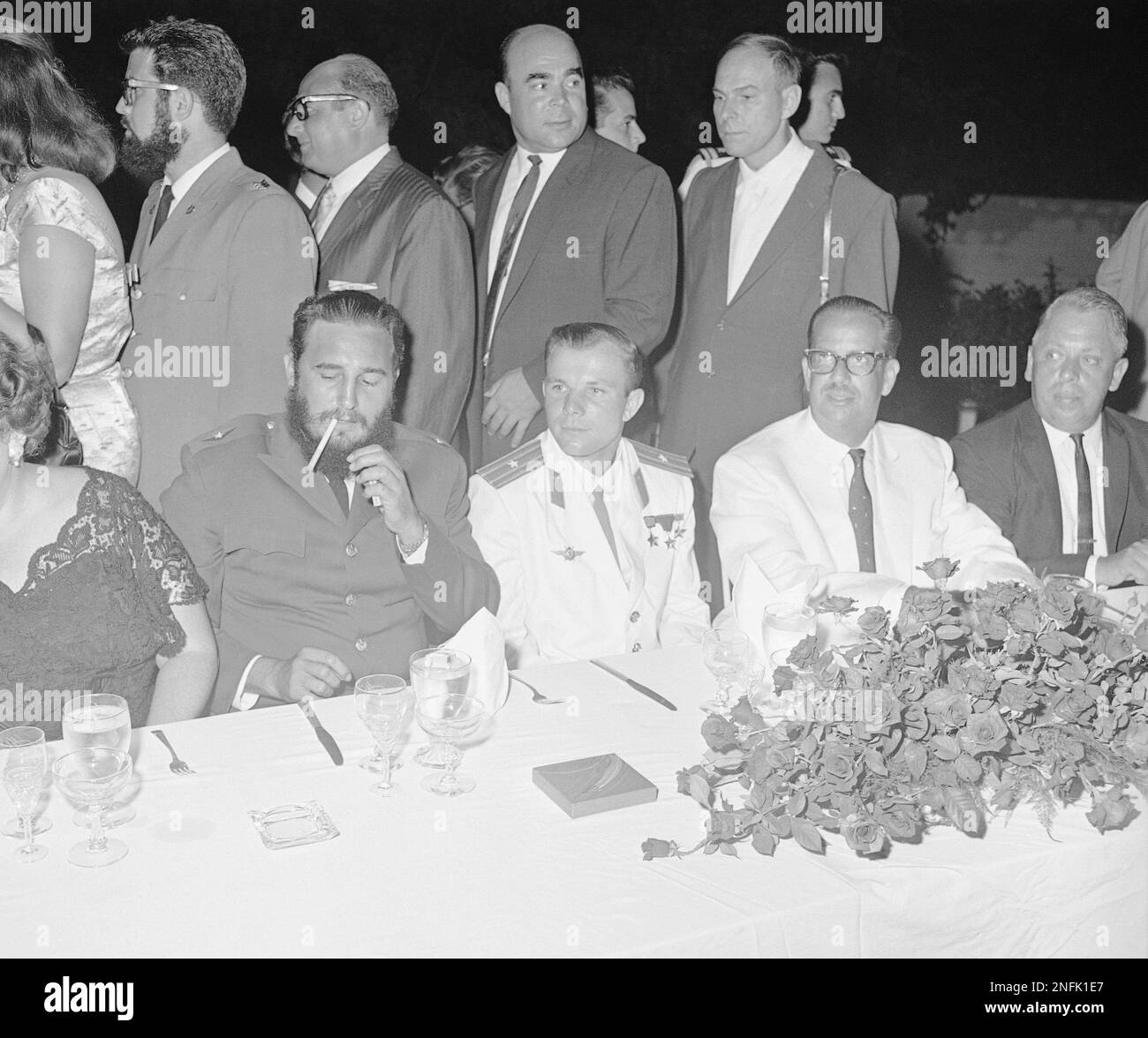 Cuba's Prime Minister Fidel Castro, left, a regular cigar smoker, opens ...