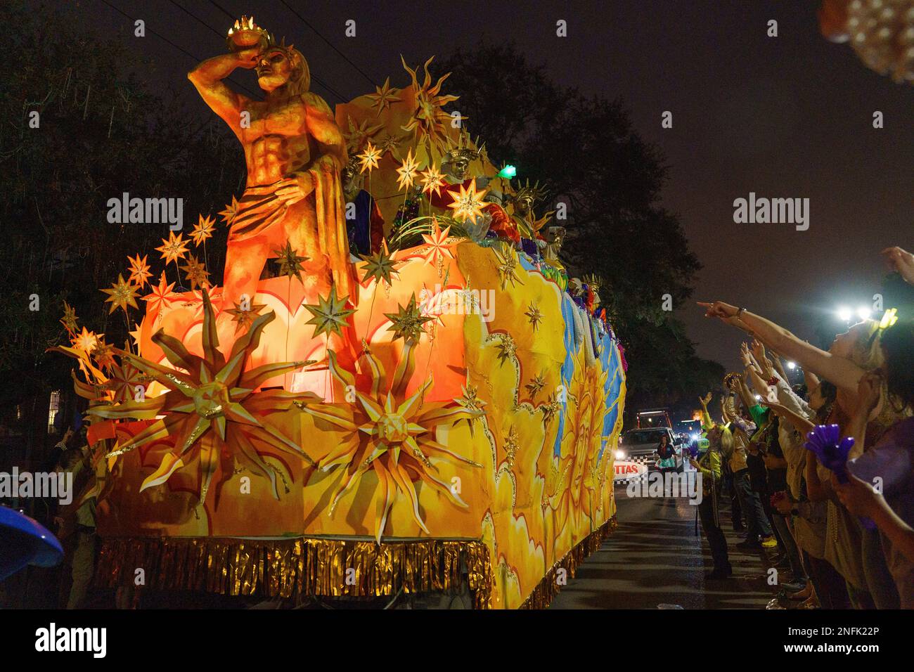 Parade goers and floats are seen at the Knights Of Babylon Parade ...