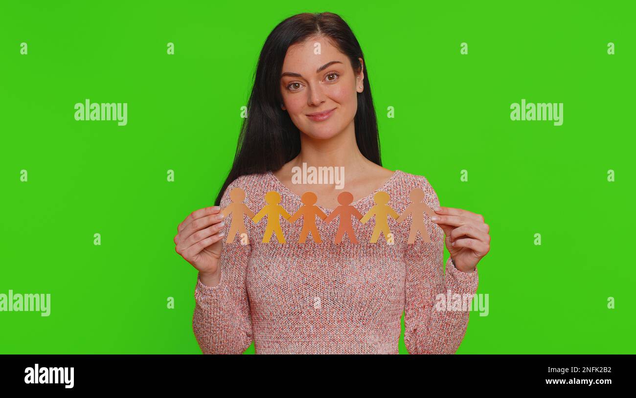 Woman showing multiracial different skin color human shape cut out of ...