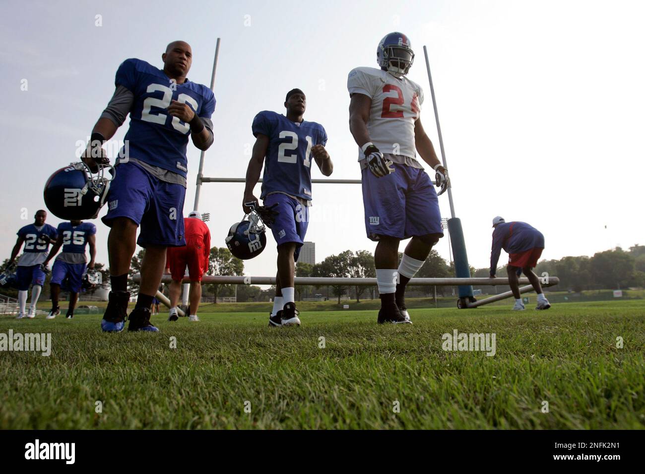 New York Giants players Sammy Knight (26), Kenny Phillips (21) and ...