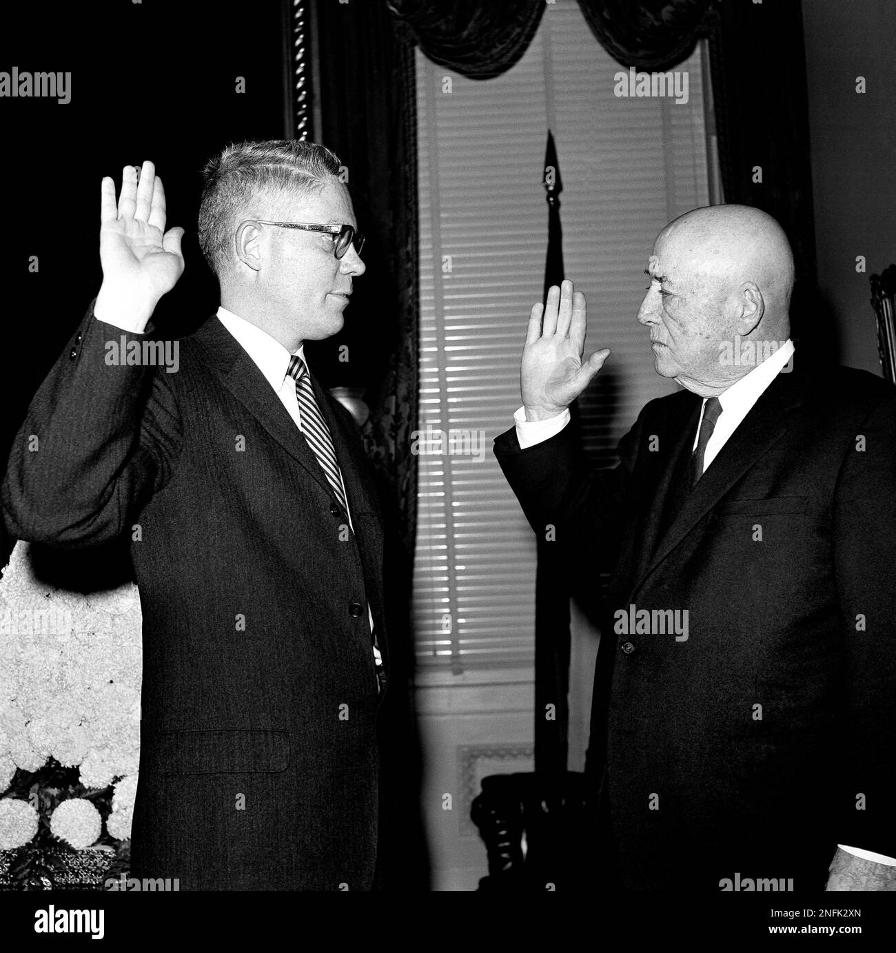 Rep. John B. Anderson, left, takes his Oath of office as a member of ...