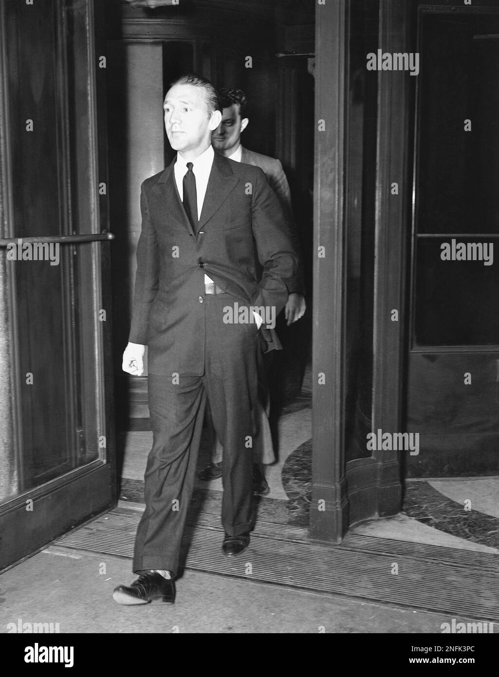 Charles Wall, 30-year-old former bellboy and clerk at the Barnum Hotel in Bridgeport, CT., is ...