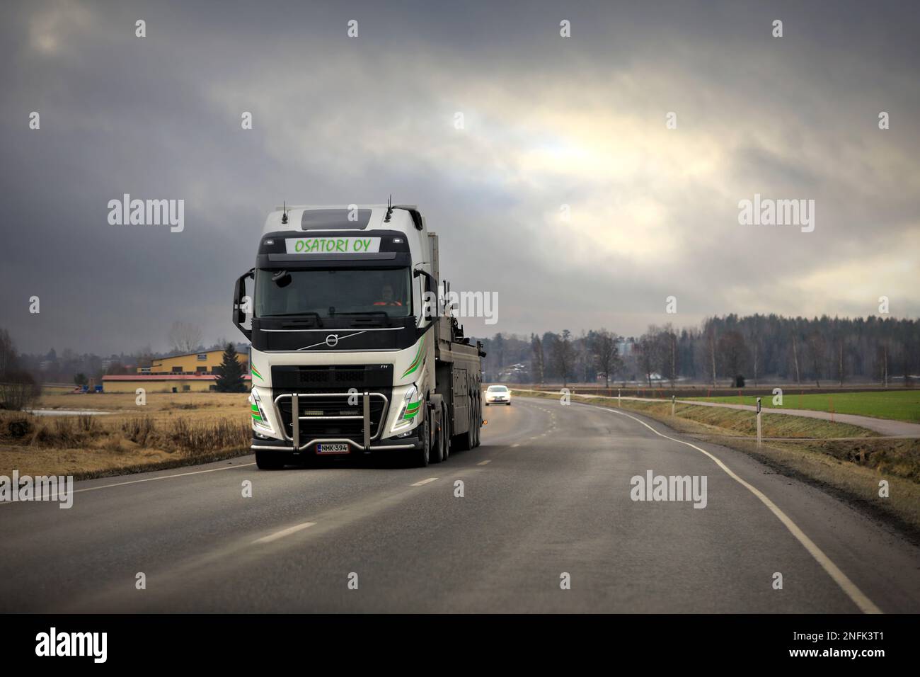 New, customised Volvo FH truck Osatori Oy at speed on highway under ...