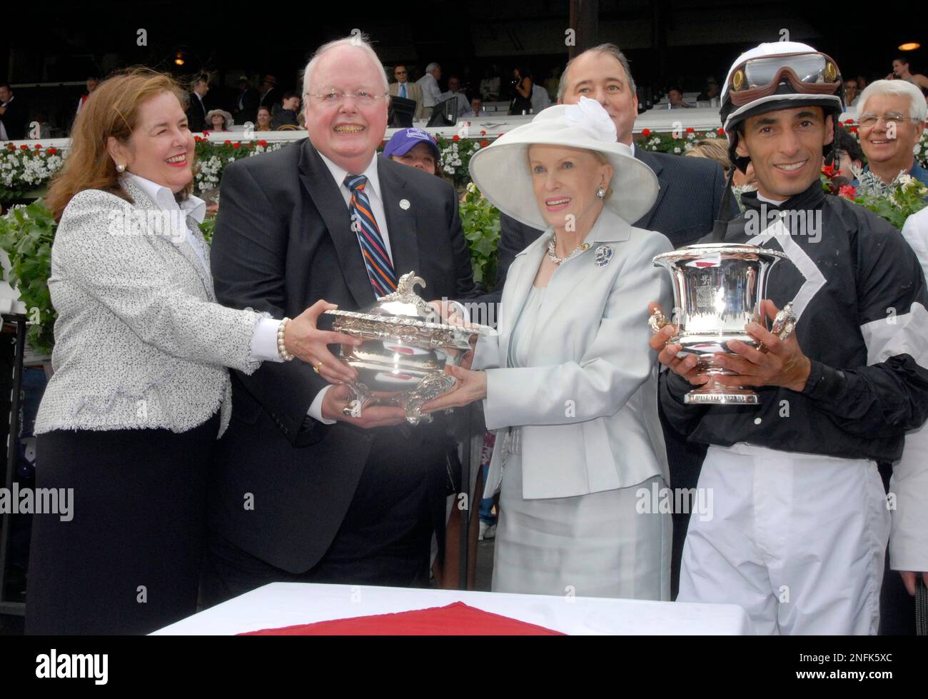 Kim and Tracy Farmer, owners of Commentator, join Marylou Whitney and ...