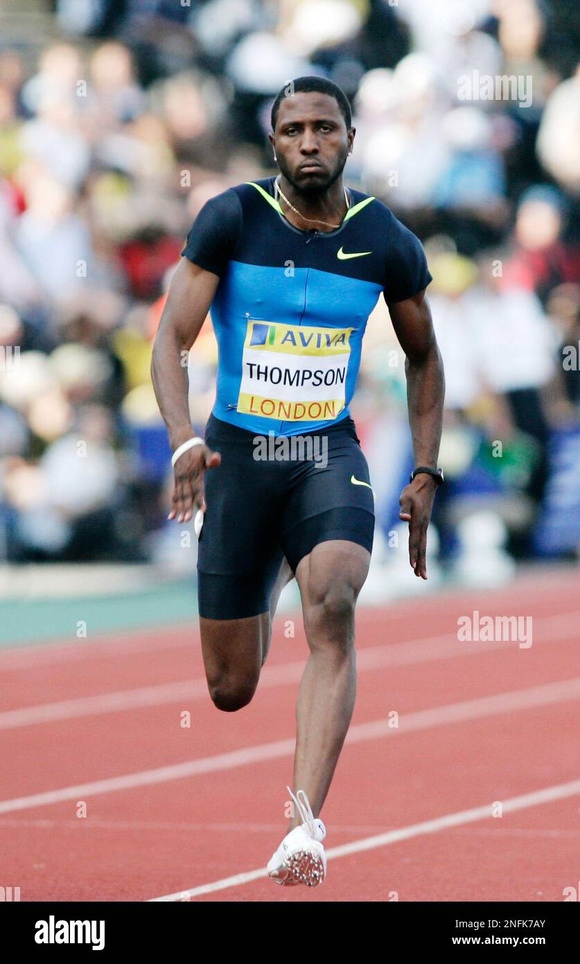 Richard Thompson of Trinidad & Tobago competes in the men's 100 meter ...