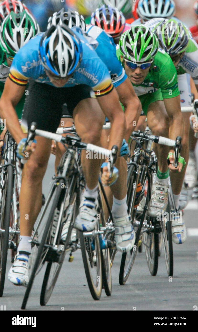 Oscar Freire of Spain, wearing the best sprinter's green jersey, right ...