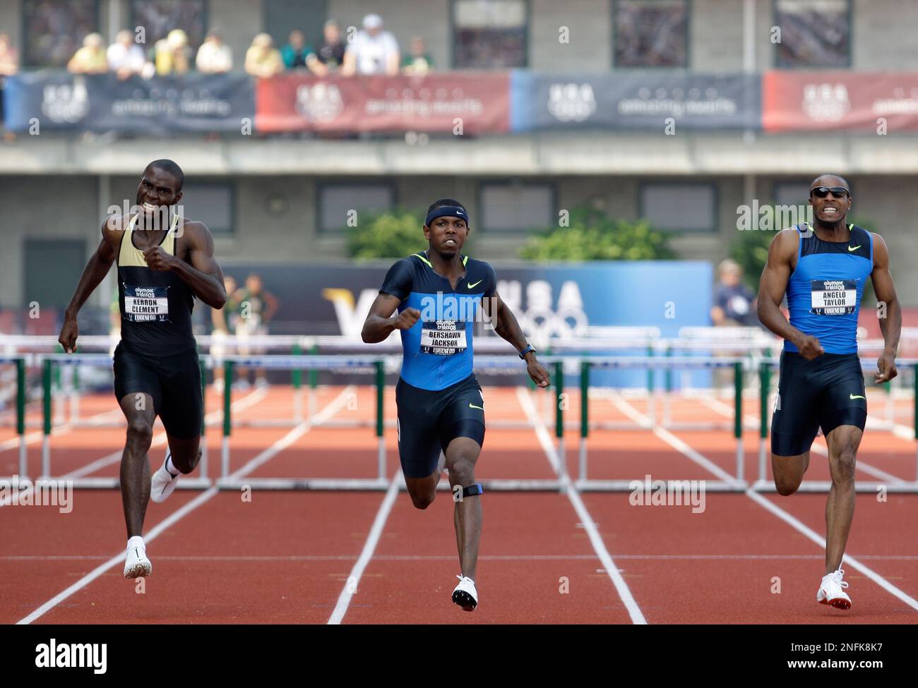 From left, Kerron Clement, Bershawn Jackson and Angelo Taylor in action ...