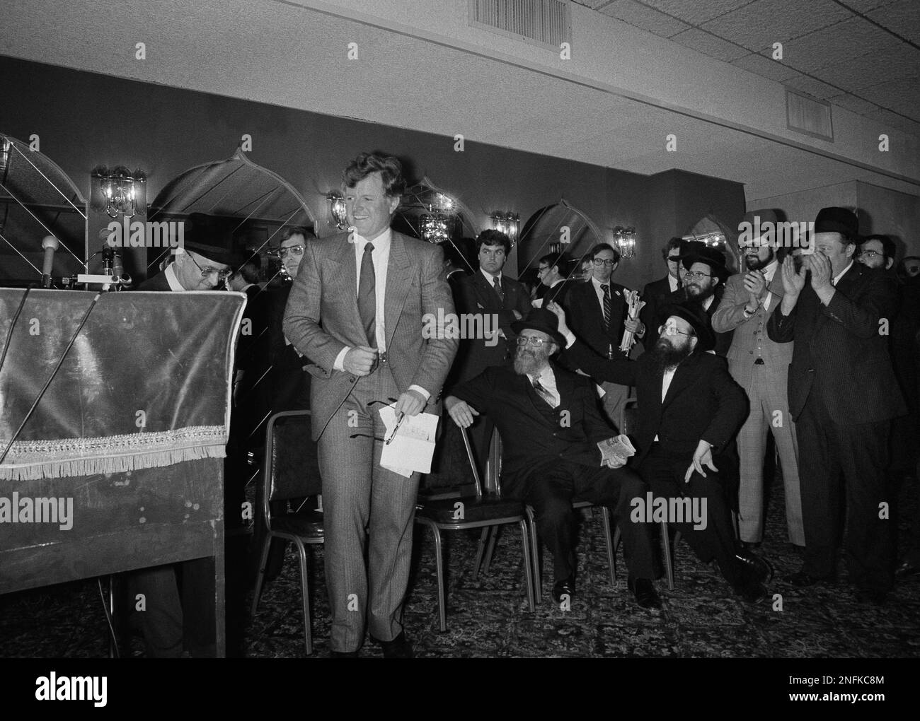 Sen. Edward Kennedy, left, shown approaching the podium for a speech at ...