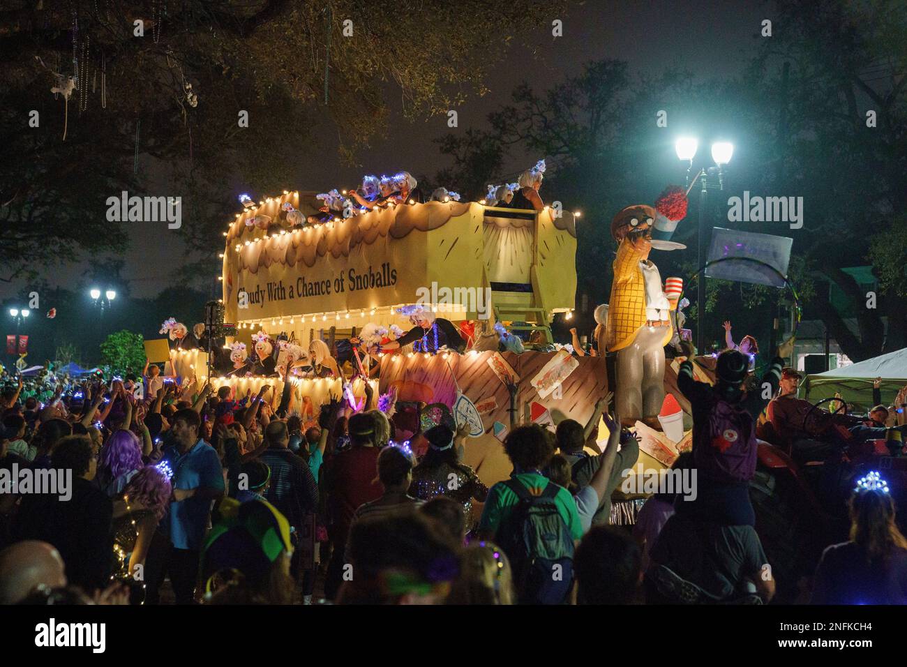 Parade goers and floats are seen at the Krewe Of Muses Parade during ...