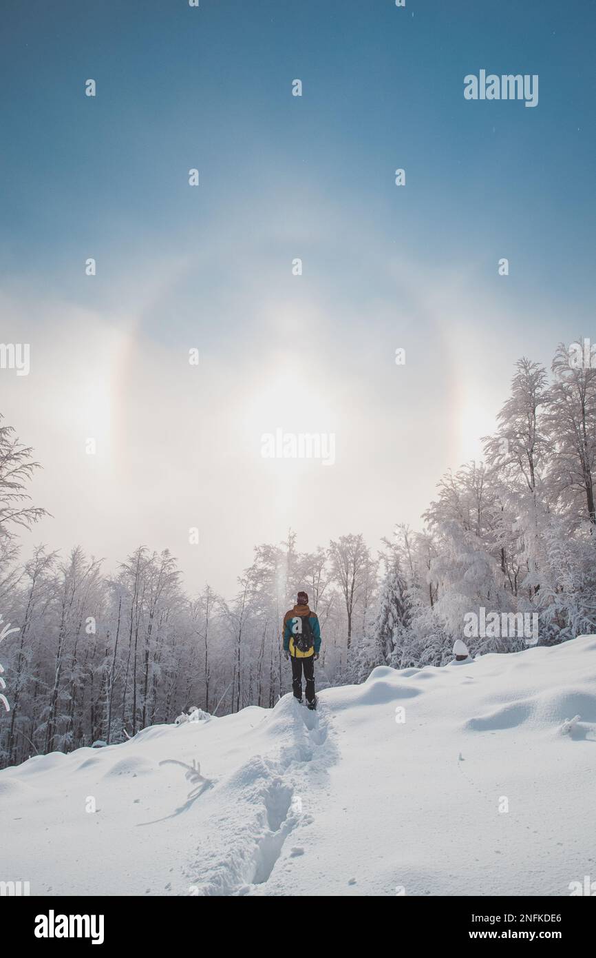 Adventurer enjoys an unusual natural phenomenon called the halo effect ...