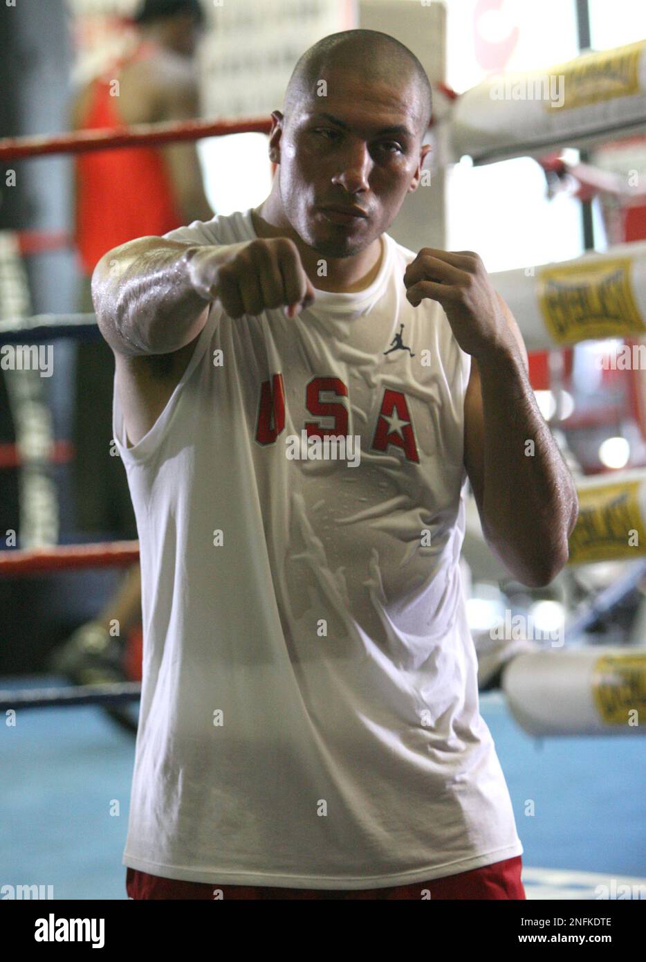 U.S. Olympic boxing team member Shawn Estrada poses for photographers ...