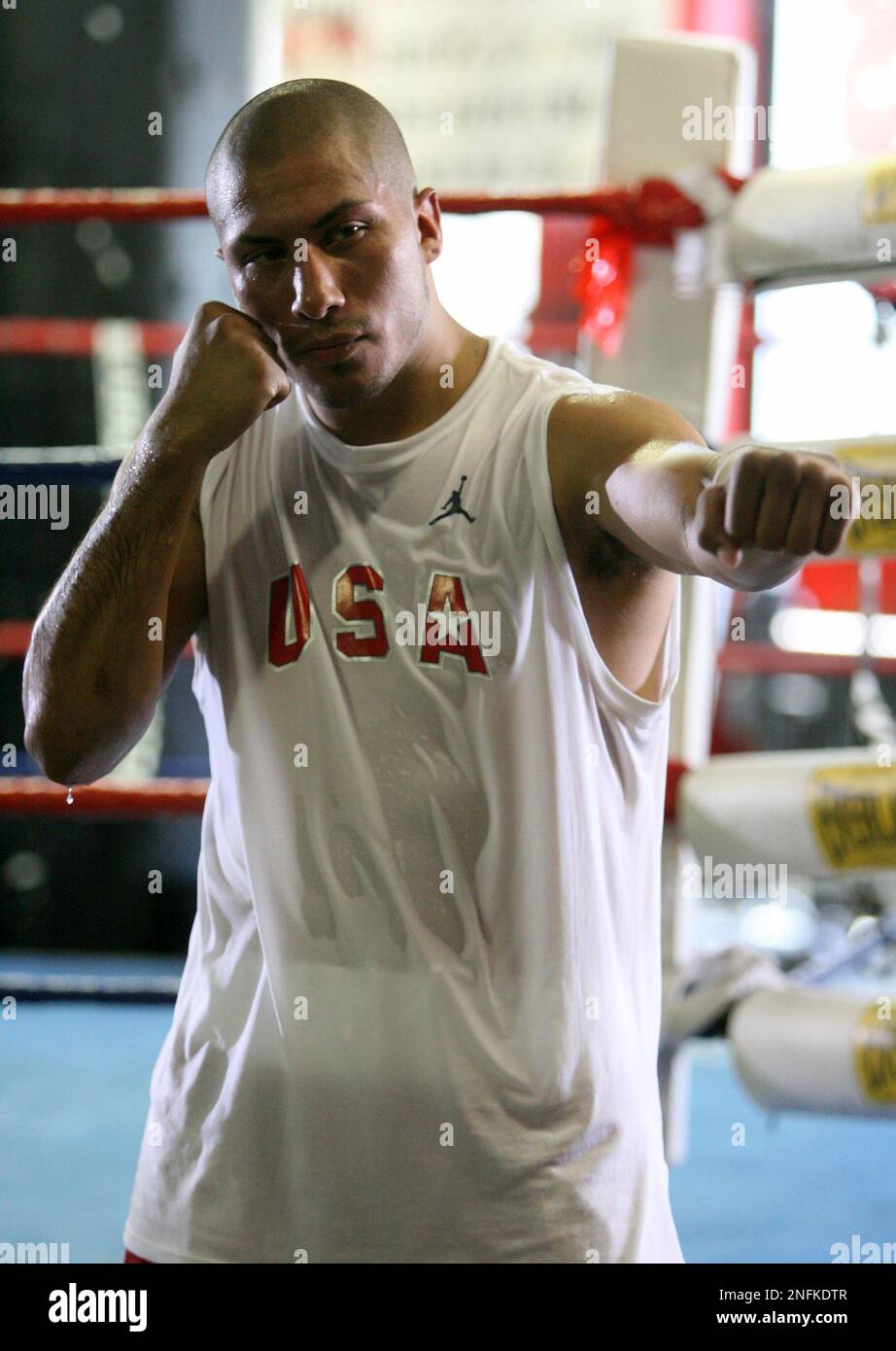 U.S. Olympic boxing team member Shawn Estrada poses for photographers ...