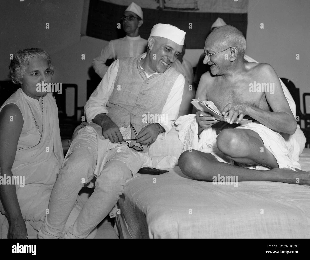 A bespectacled Mohandas Gandhi, the Mahatma, who eventually led India to its independence ...