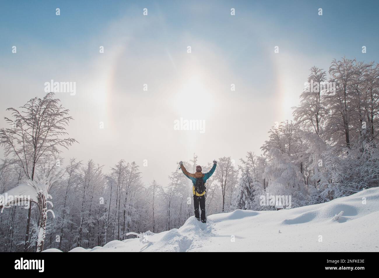Adventurer enjoys an unusual natural phenomenon called the halo effect ...