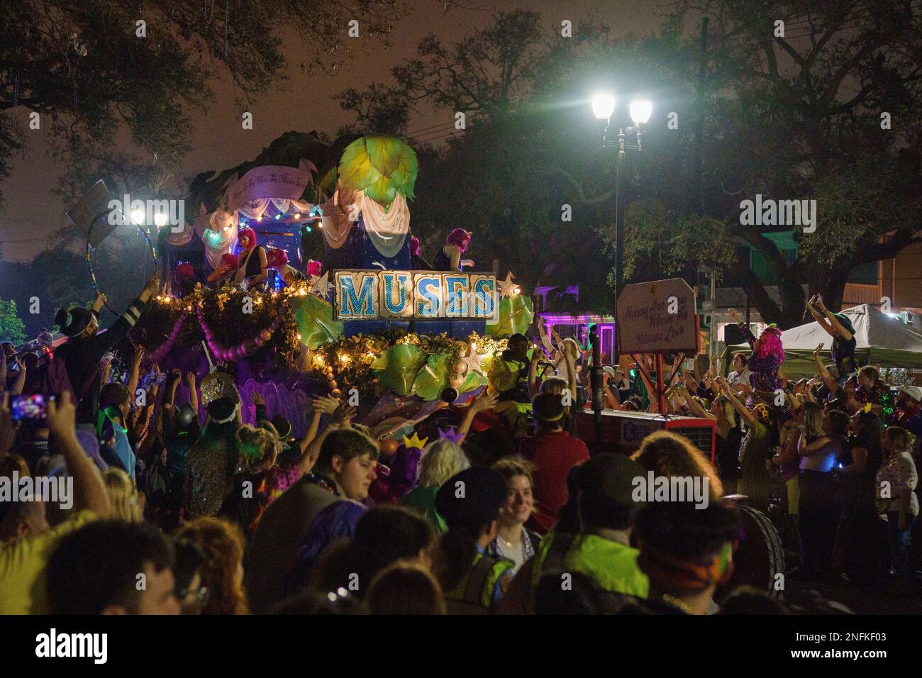 Parade goers and floats are seen at the Krewe Of Muses Parade during ...