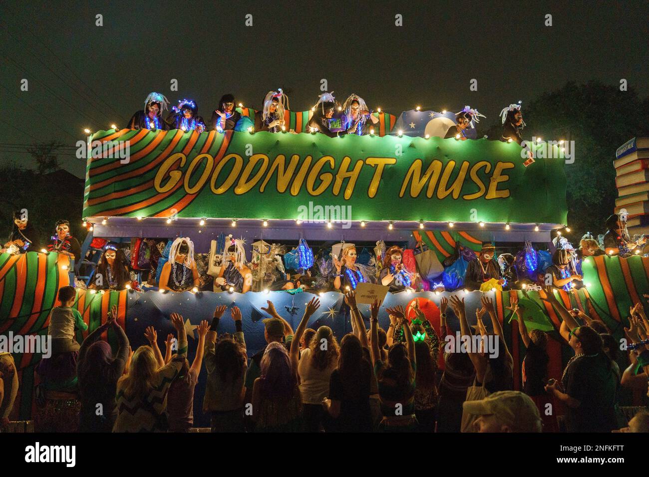 Parade goers and floats are seen at the Krewe Of Muses Parade during ...