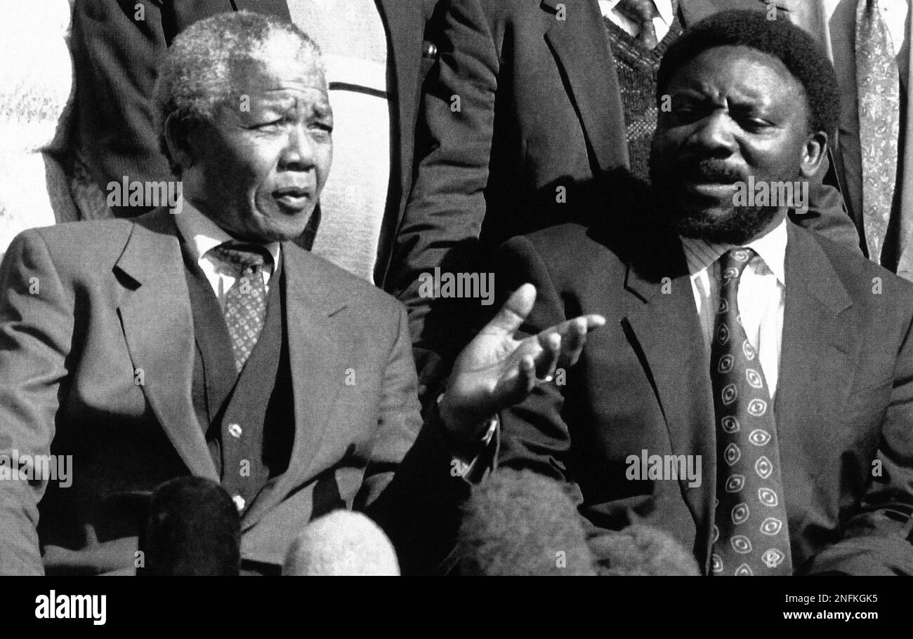 African National Congress President Nelson Mandela, right, talks with Secretary Cyril Ramaphosa ...