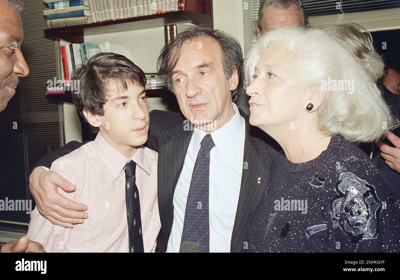 Elie Wiesel poses with his wife Marion, right and son Elisha Tuesday ...