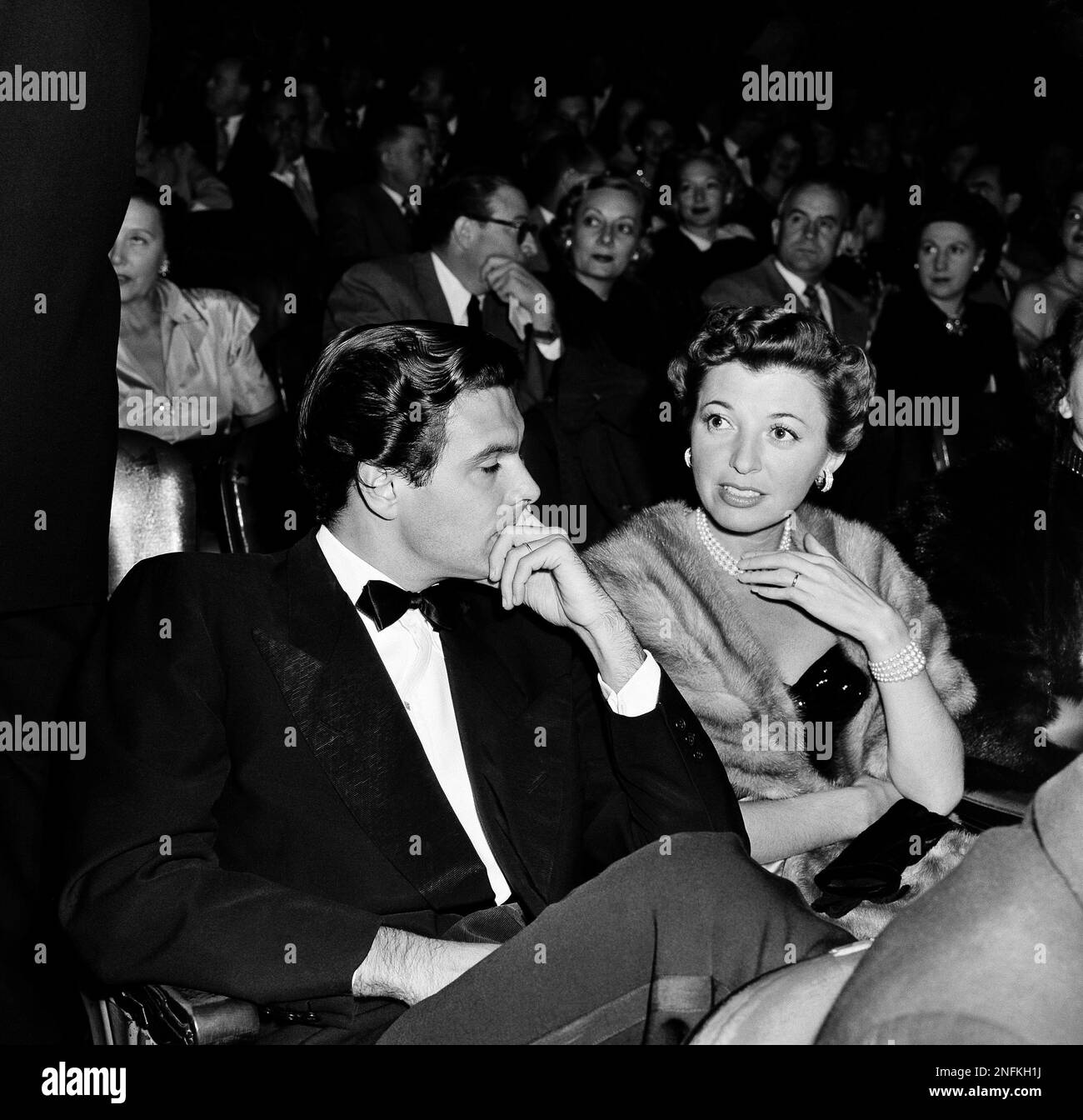 French Actor Louis Jourdan and his wife, Berthe Fredrique, chat while ...