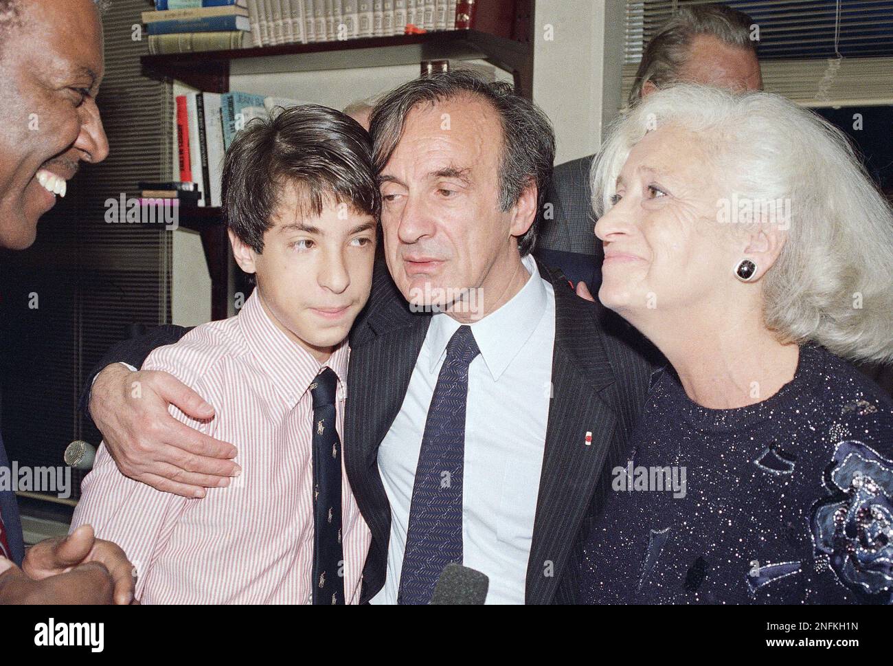 Elie Wiesel poses with his wife Marion, right and son Elisha Tuesday ...