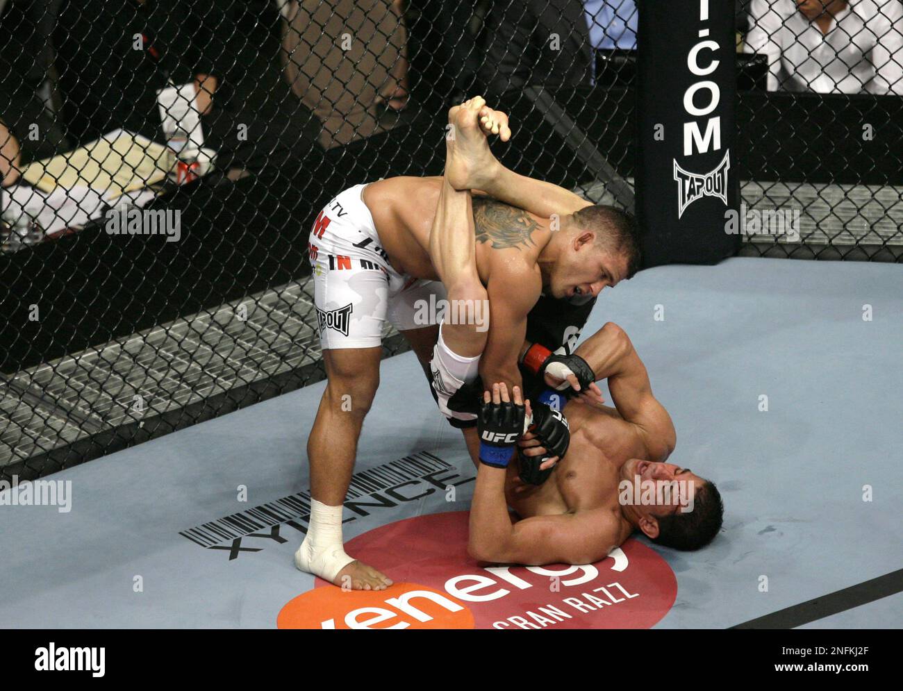 Tyson Griffin, left, competes against Marcus Aurelio in the UFC ...