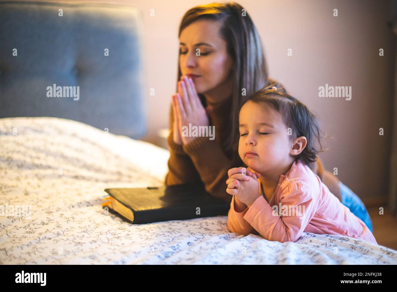 Child praying bed hi-res stock photography and images - Alamy
