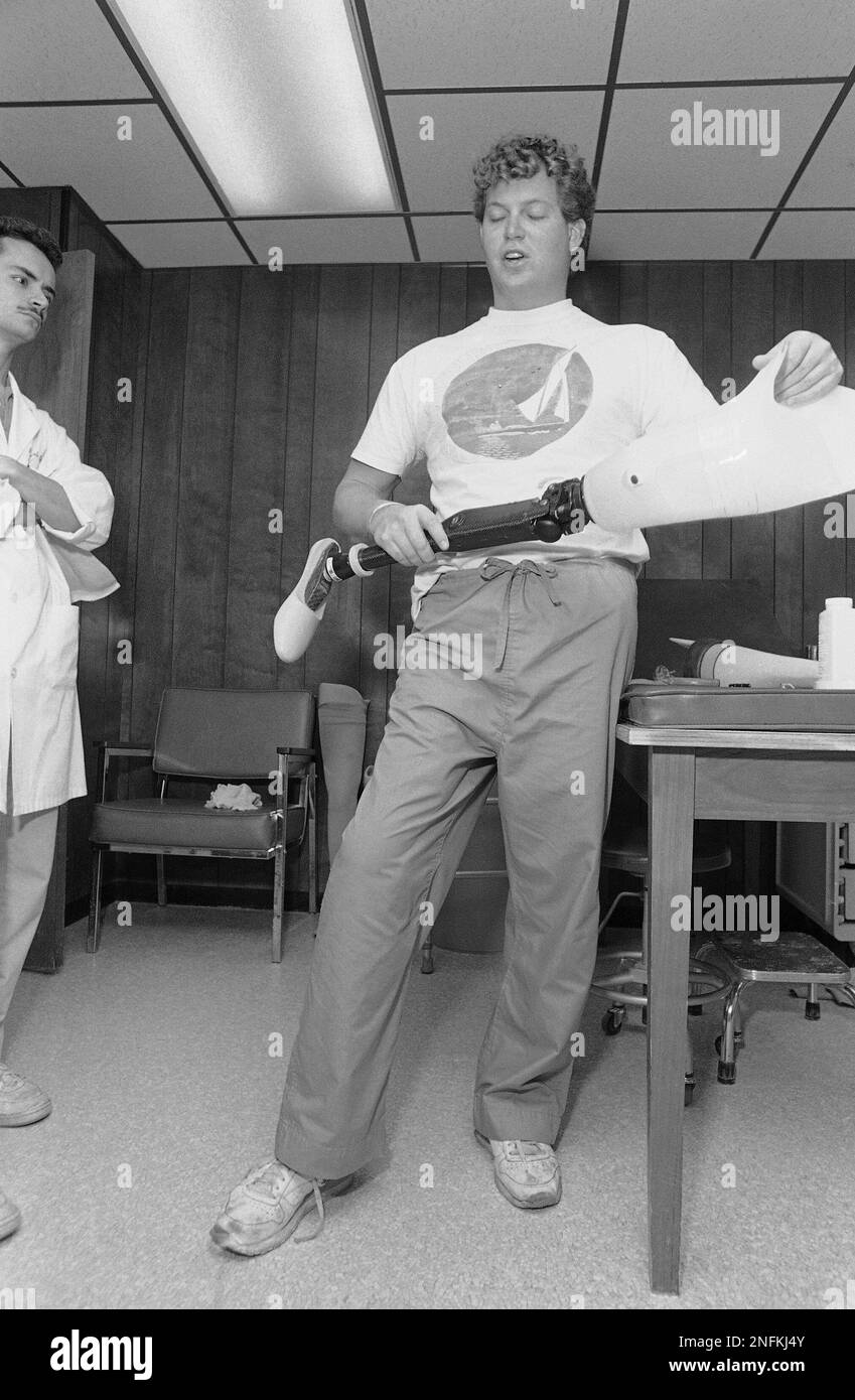 Ted Kennedy Jr. examines a new prosthetic leg, similar to the one he ...