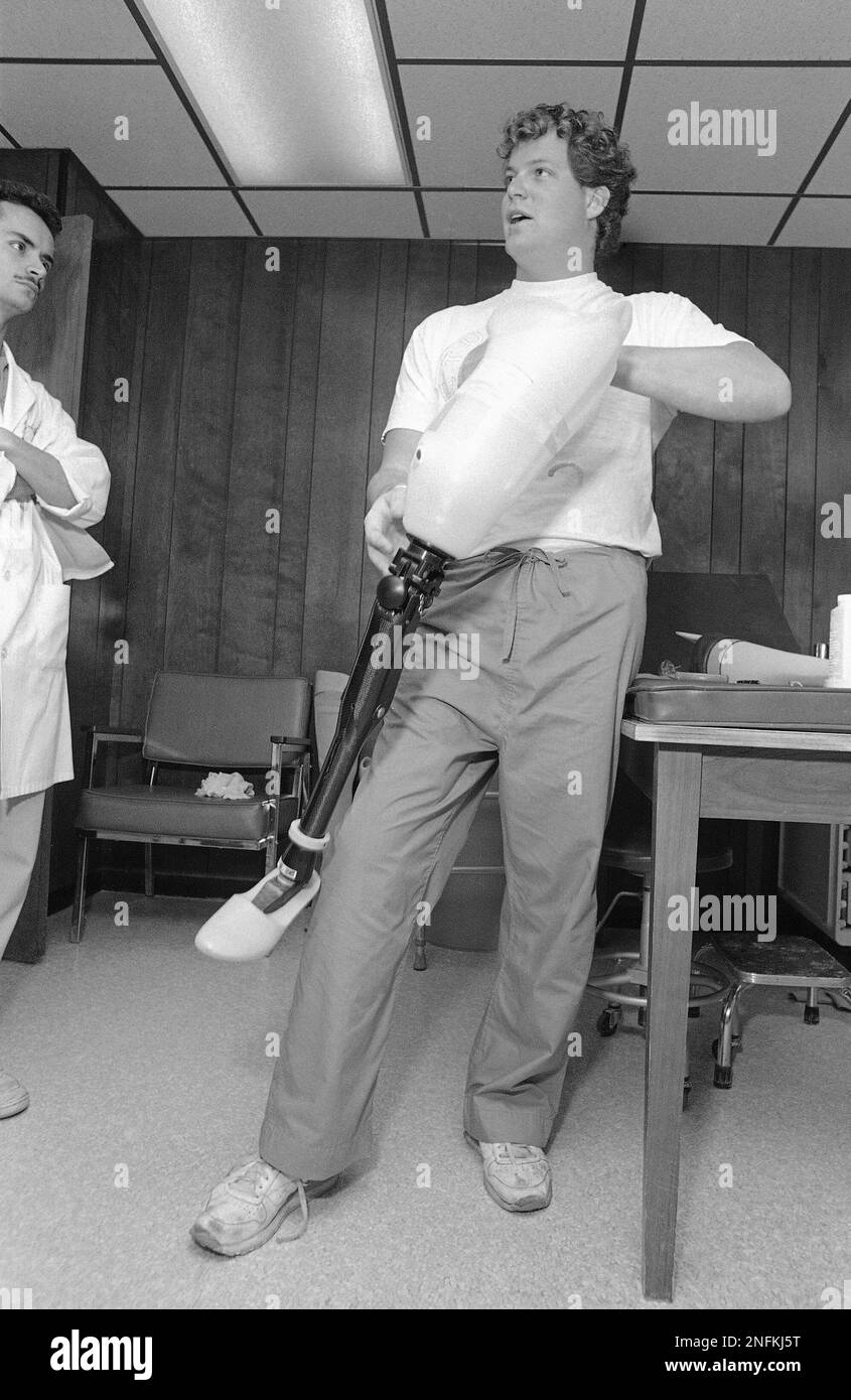 Ted Kennedy Jr. examines a new prosthetic leg, similar to the one he ...