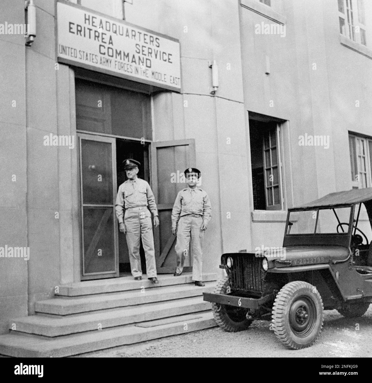 Two Americans stand at the entrance to the former fascist Italian ...