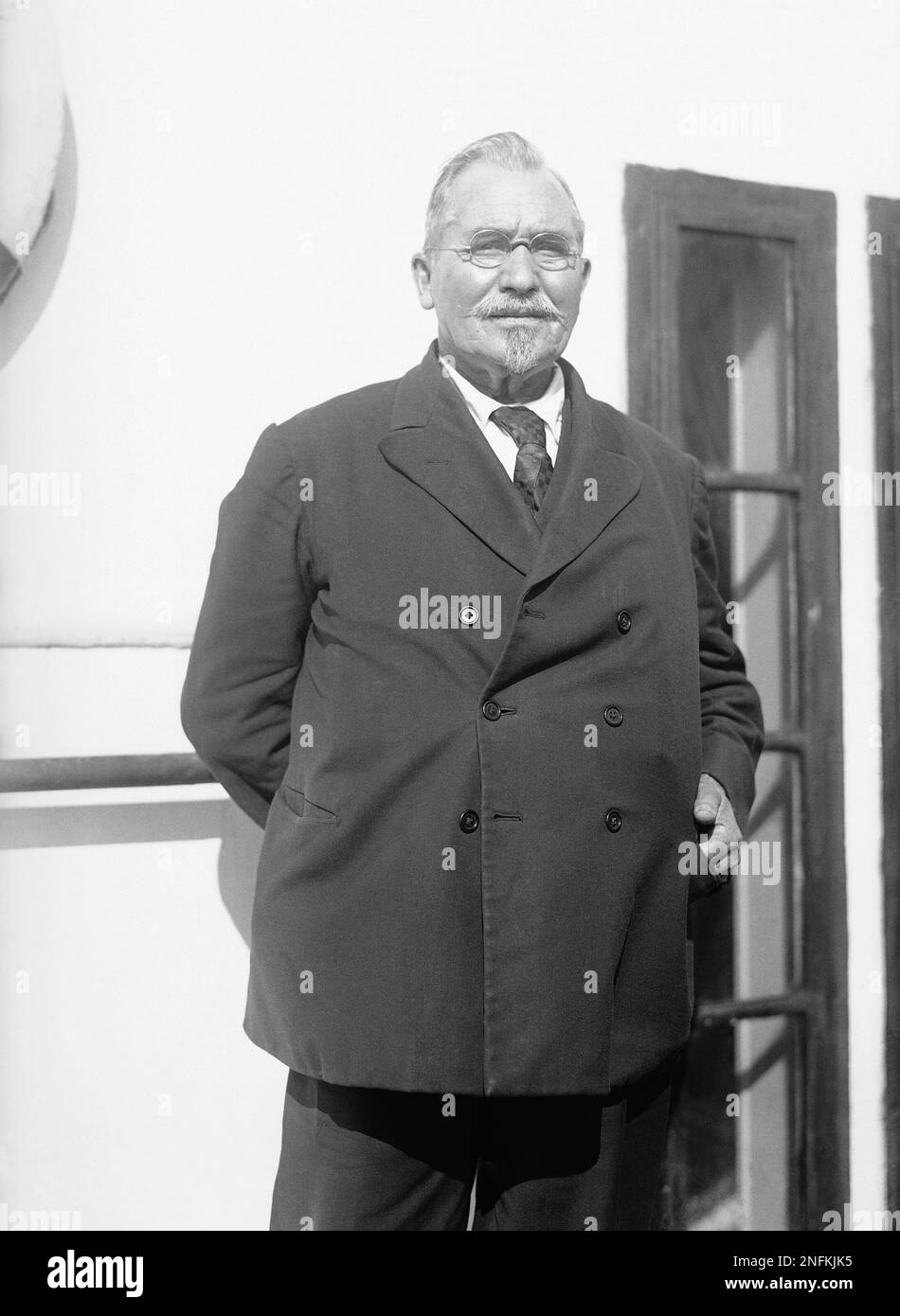 Tom Mann, 77-year-old British trade unionist, shown on his arrival in ...