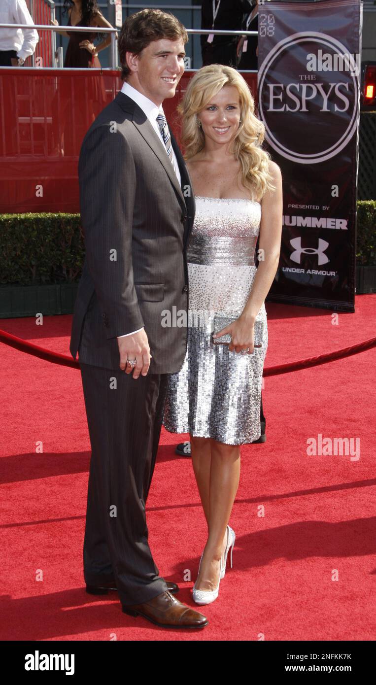 Eli Manning and his wife Abby McGrew arrive at the ESPYs Awards on ...