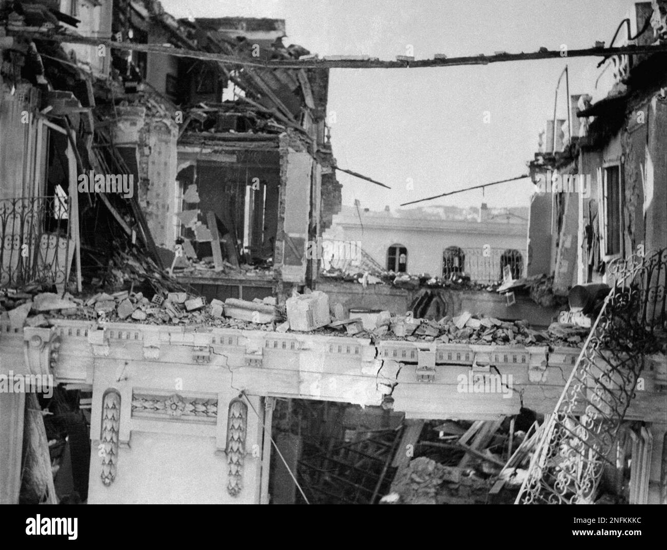 Buildings photographed Dec.14, 1942 in Algiers, Algeria were damaged by ...