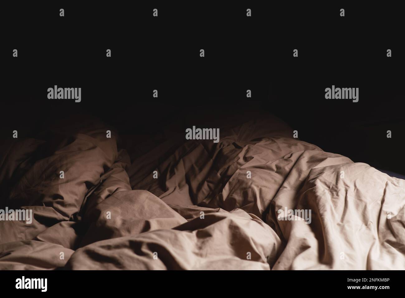 Dark room with unmade bed hi-res stock photography and images - Alamy