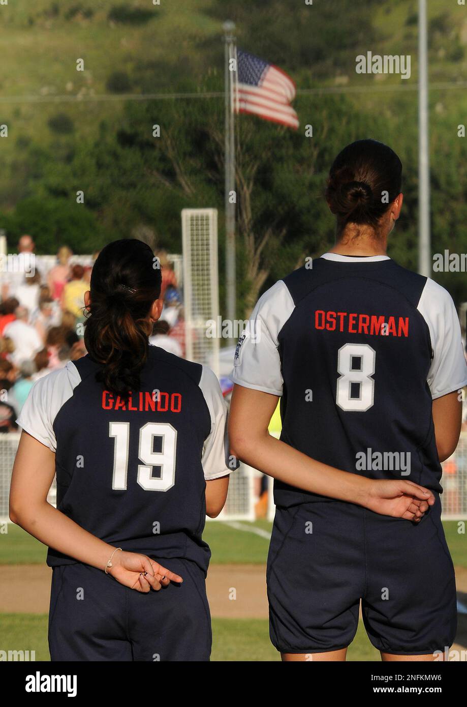 Team USA softball players Vicky Galindo, left, and Cat Osterman stand ...