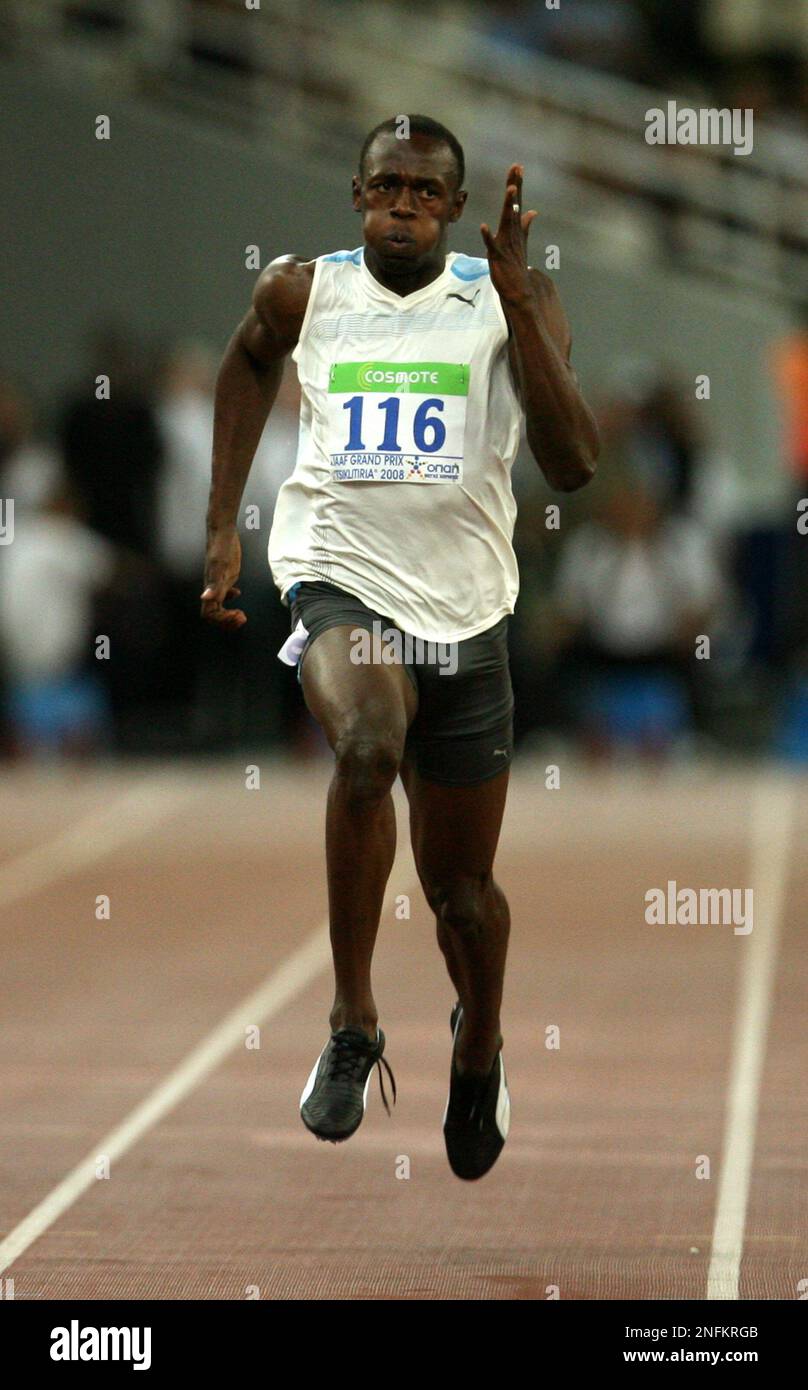 Usain Bolt from Jamaica competes in the 200 meters during IAAF Athens ...