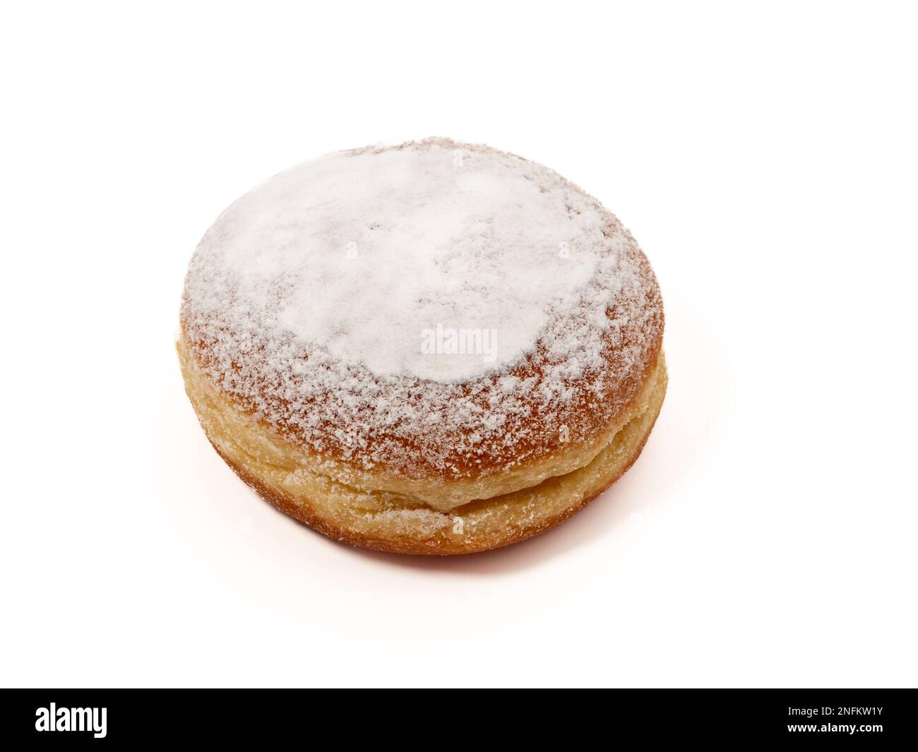 Freshly baked and dusted with powdered sugar German donuts. Donut ...