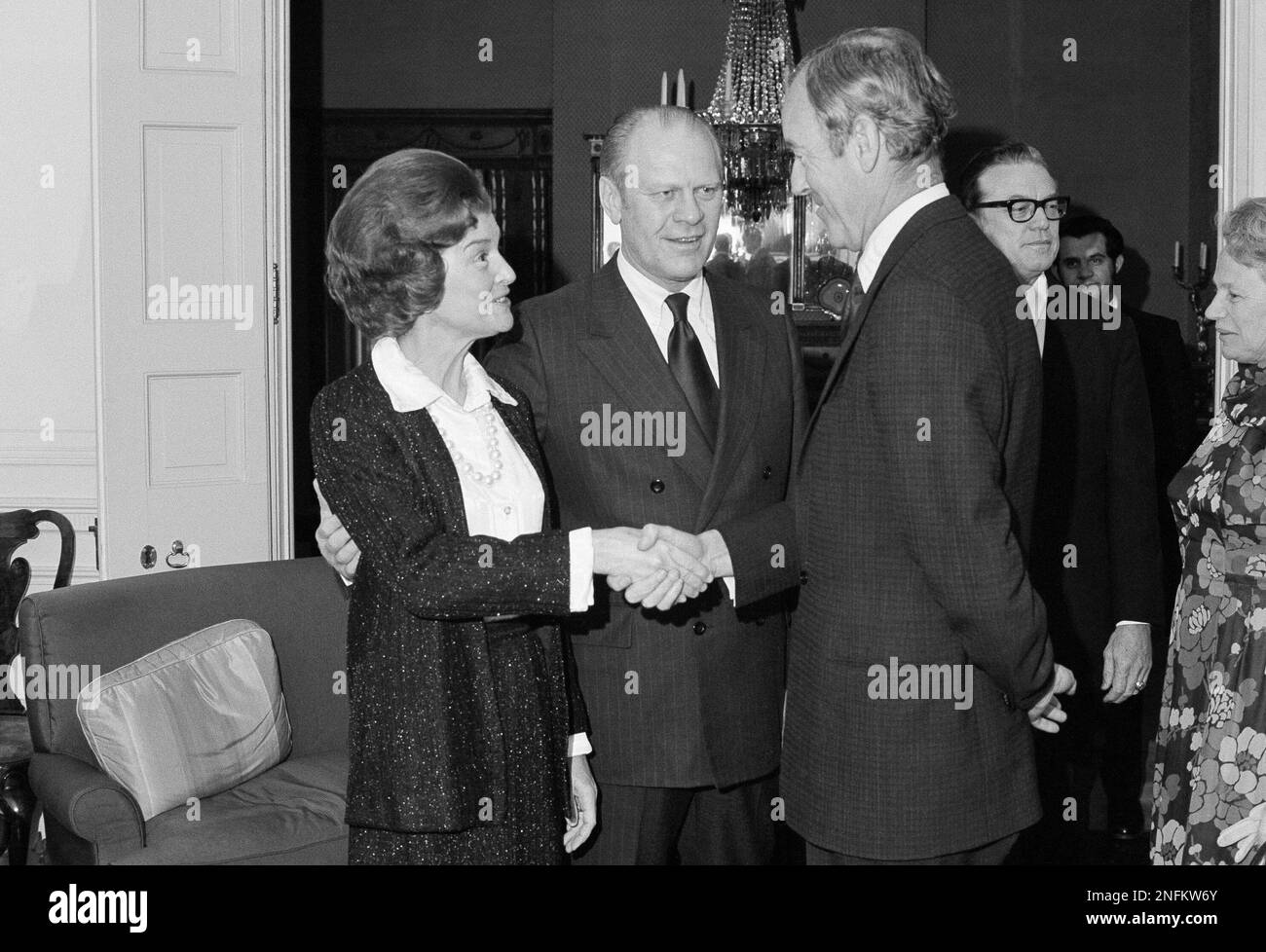 Vice President Gerald Ford, center, and Mrs. Betty Ford, left, greet ...