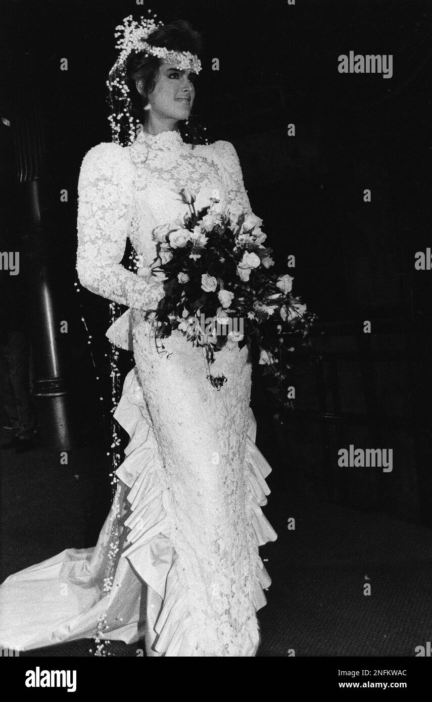 Actress-model Brooke Shields models a wedding gown designed by Japanese ...