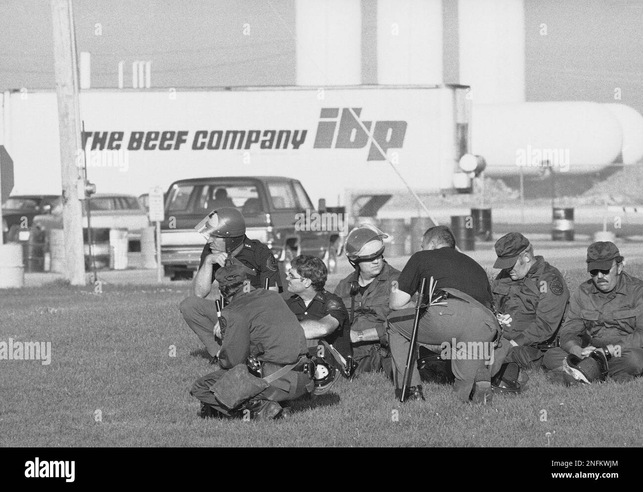 Nebraska State Troopers relaxed on the ground of the Iowa Beef ...