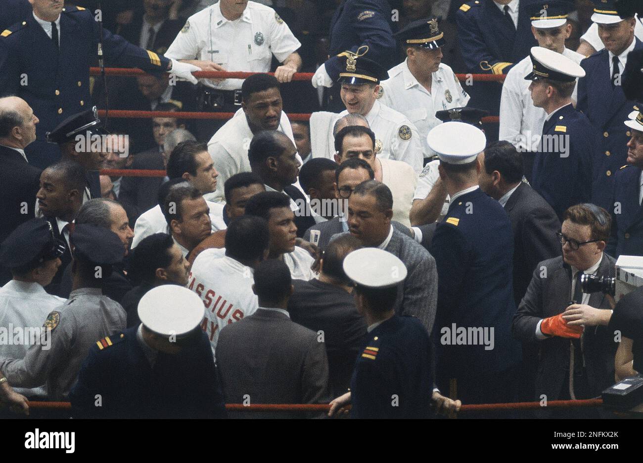 Muhammad Ali, or Cassius Clay, as he was known at the time, is shown ...