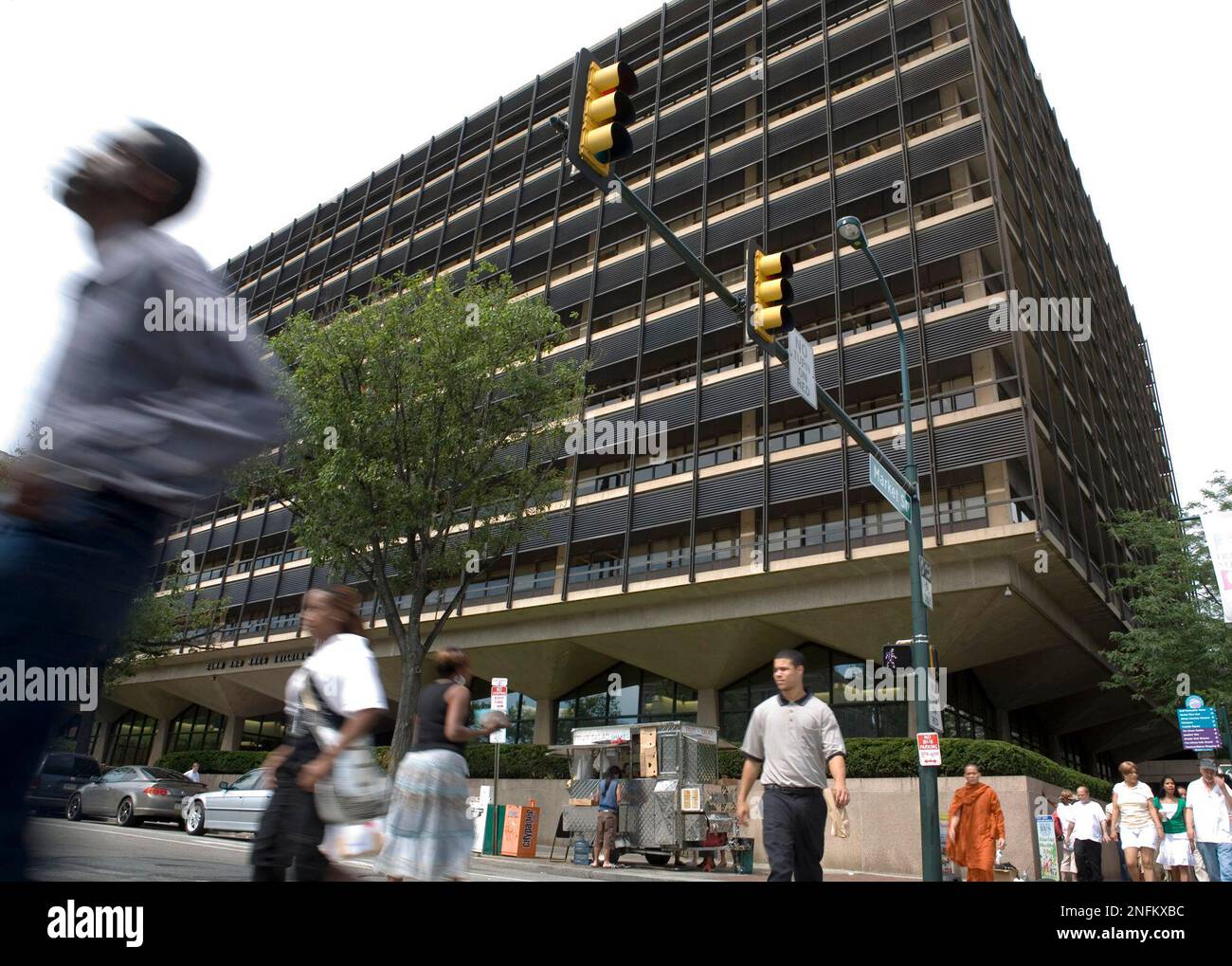 Pedestrians walk near the Rohm and Haas Co. headquarters in ...