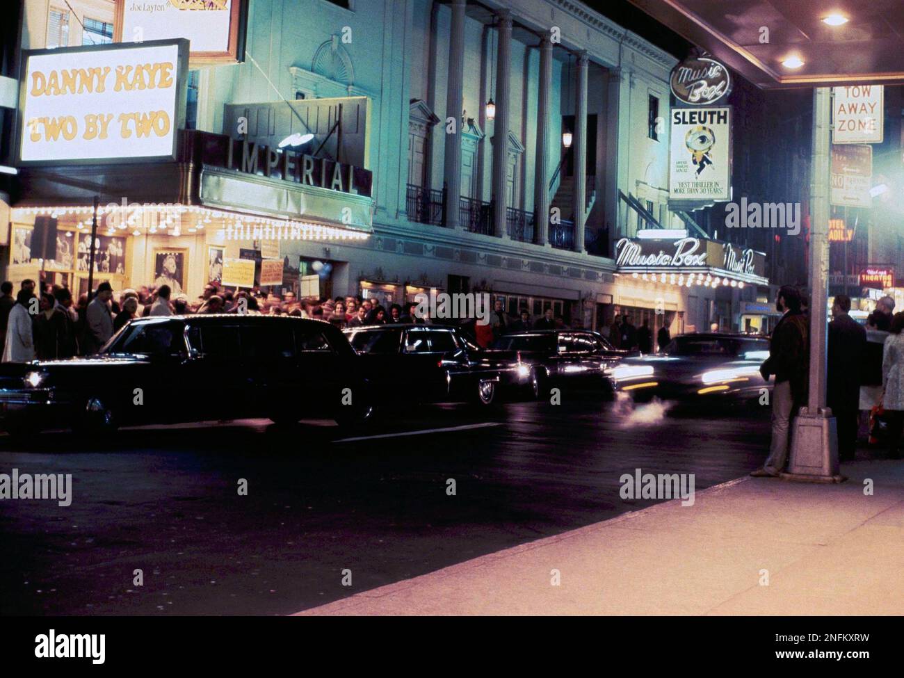 Broadway theaters light the night in the Shubert Alley theater section ...