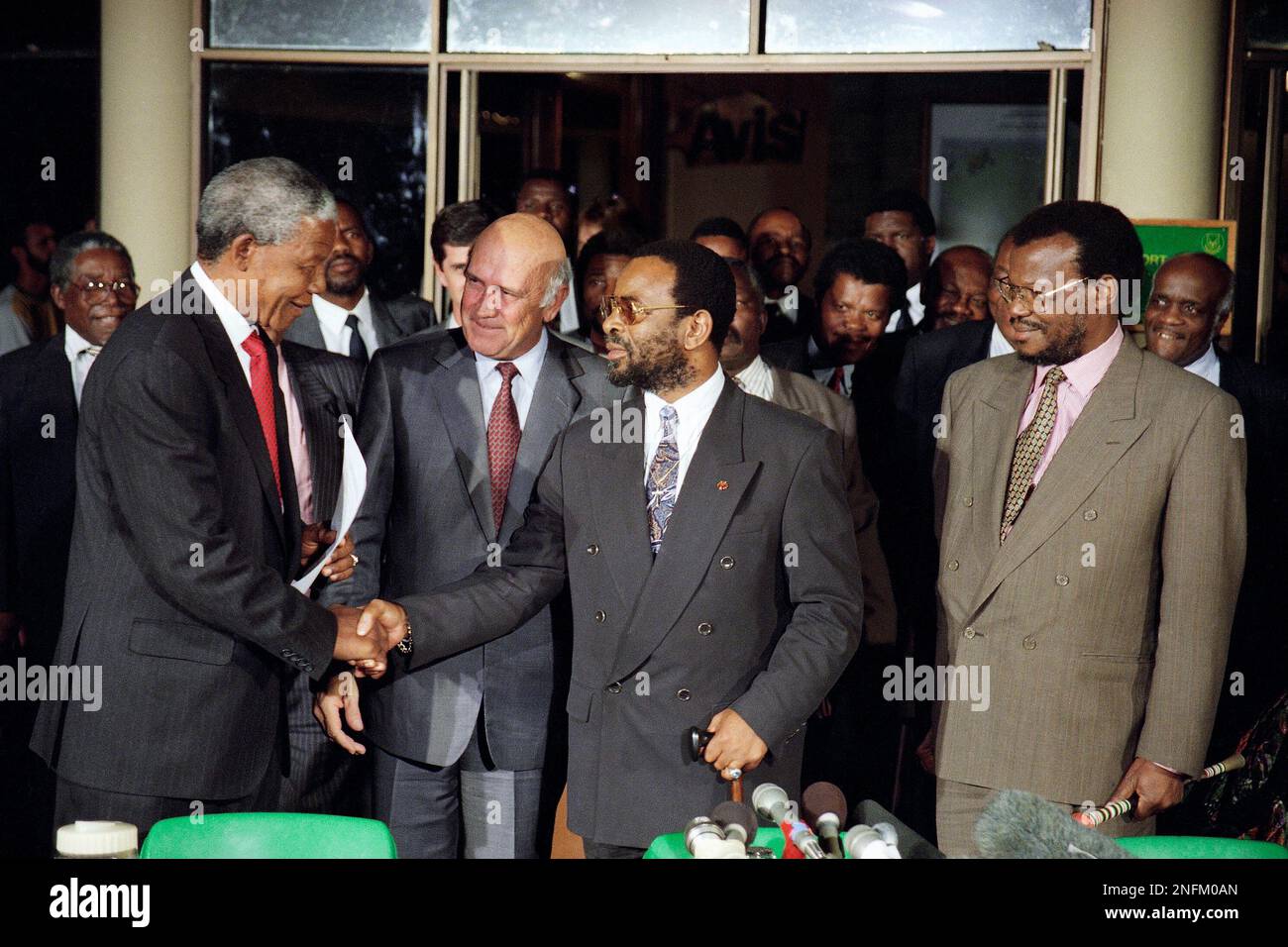 African National Congress leader Nelson Mandela, left, shakes hands with Zulu King Goodwill ...