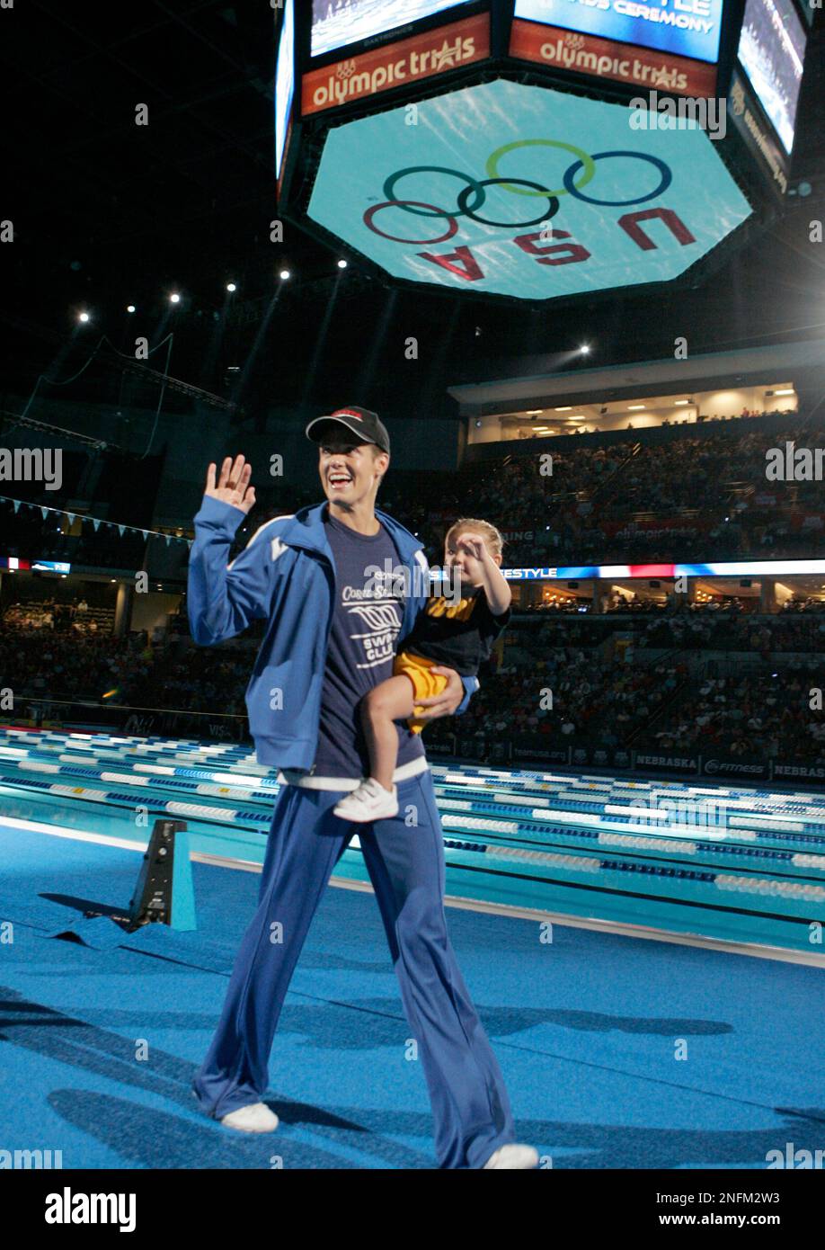 Dara Torres walks to the awards ceremony for the women's 50-meter ...